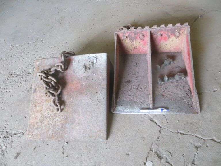 Pair of HEAVY Steel Chocks - Lambrecht Auction, Inc.