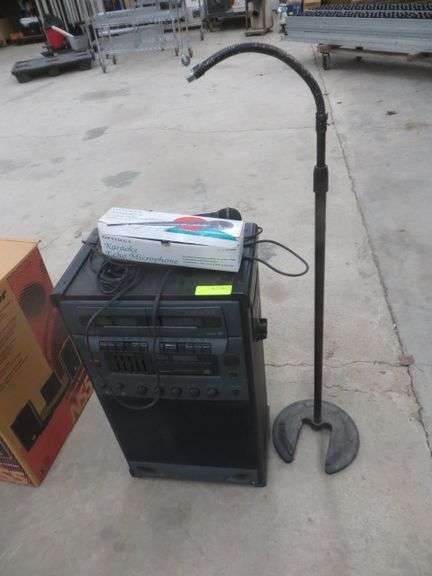 Optimus Karaoke Player & Microphone - Lambrecht Auction, Inc.