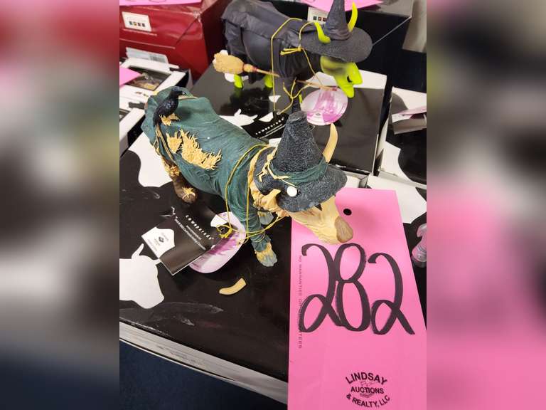 4 cow parade Wizard of Oz figurines - Lindsay Auctions LLC