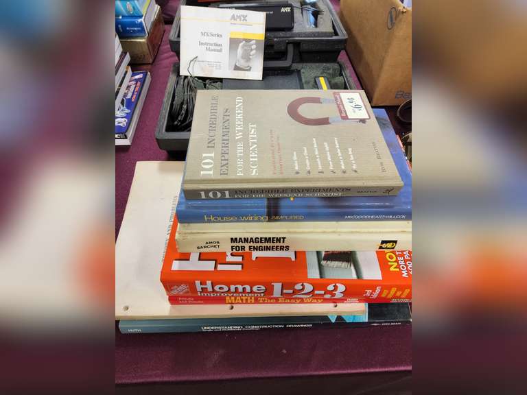 Group of books, power inverter & other SEE PICS - Lindsay Auctions LLC