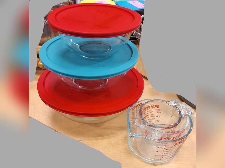 3 pyrex glass bowls with lids, & 3 various size glass measuring cups (2 ...