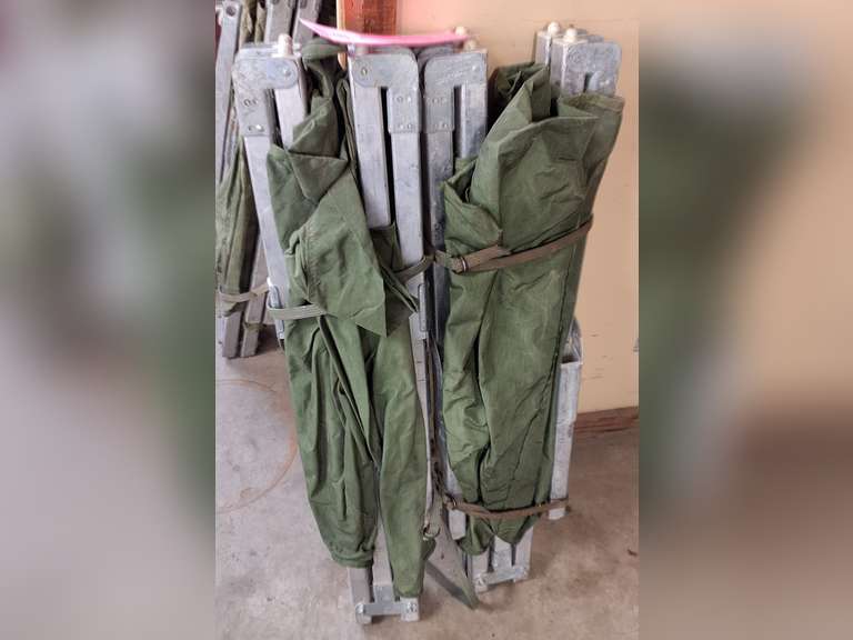 2 military cots - Lindsay Auctions & Realty LLC