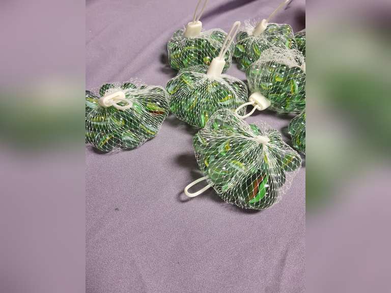 Flat of approx 10 marble sets (each set has small marbles & 1 big ...