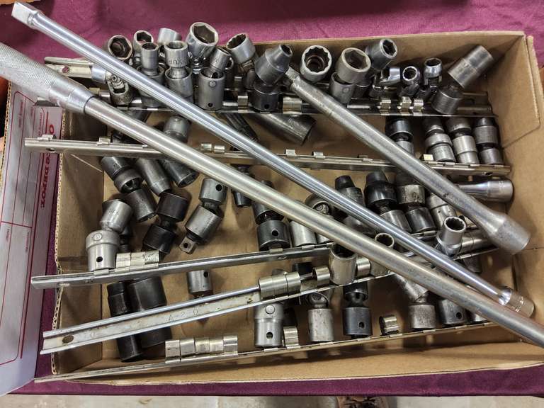 Flat of various size sockets, extensions, breaker bar & others ...