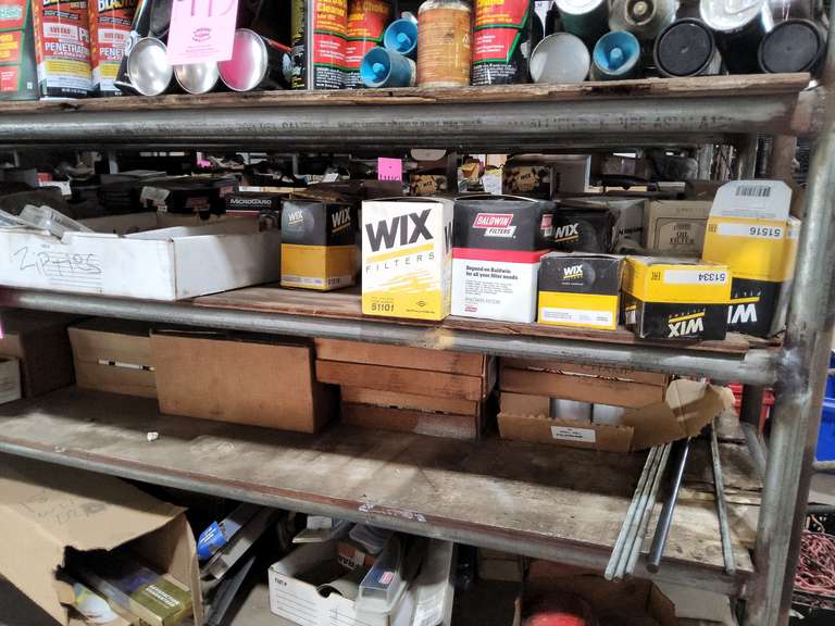 (3rd & 4th shelves from top on right side only): Fuel filters, oil ...