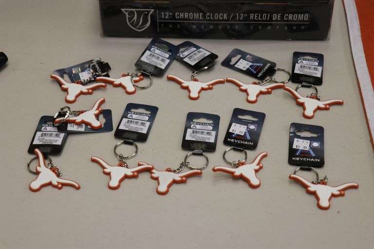 TEXAS LONGHORN CLOCKS, BANNER, AND KEY CHAINS - Lawler Auction Company