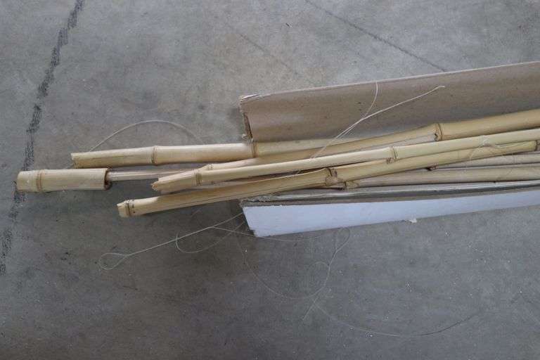 BOX OF CANE POLES APPRX 12FT LONG - Lawler Auction Company