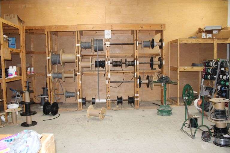LOT OF PARTIAL ROLLS OF ELECTRICAL WIRING, WIRE, RACKS, SHELVES WITH ...