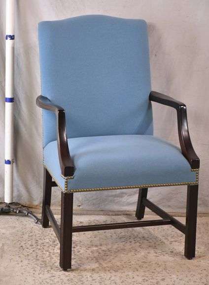 The Taylor Chair Co. blue upholstered open arm chair with mahogany ...