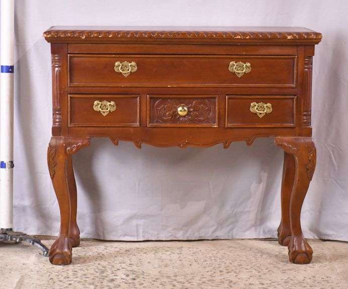Small carved mahogany lowboy/console with ball in claw feet; 37-2586 ...