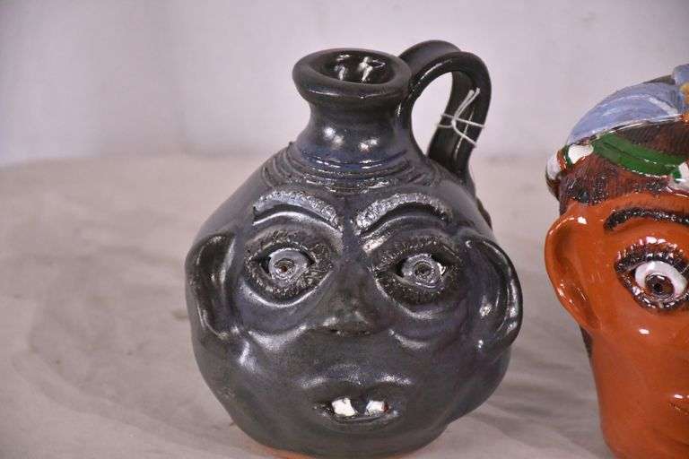 Group of 3 signed pottery face jugs; 155-947 - R.H. Lee & Co. Auctioneers