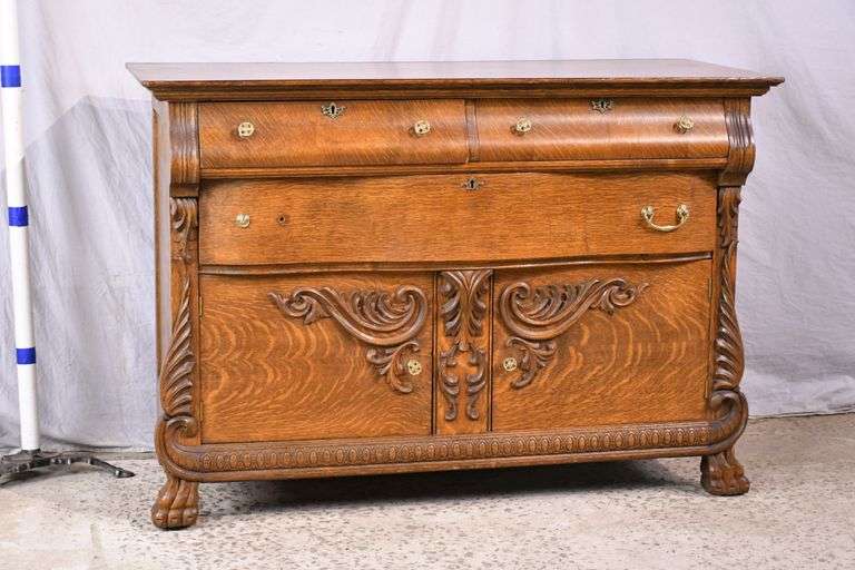 Carved oak server with paw feet; 68-7521 - R.H. Lee & Co. Auctioneers