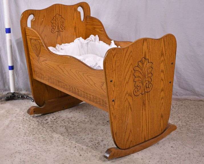 Oak rocking cradle with bedding; 17204-011 - R.H. Lee & Co. Auctioneers