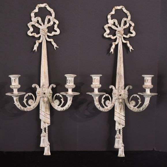Pair of ornate brass wall sconces with distressed off-white finish; 68 ...