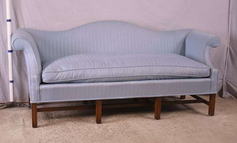 Blue upholstered Chippendale style camelback sofa with down cushion ...