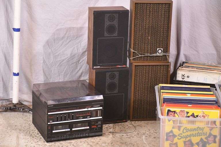 Sharp stereo music system with speakers and 6 boxes of records; 74 ...