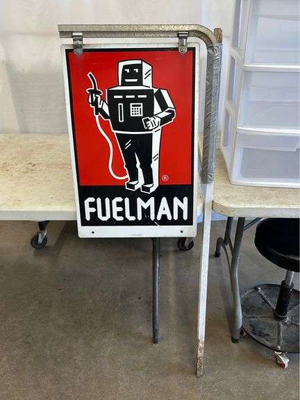 Fuel Man Tin Sign - Lee Real Estate & Auction Service