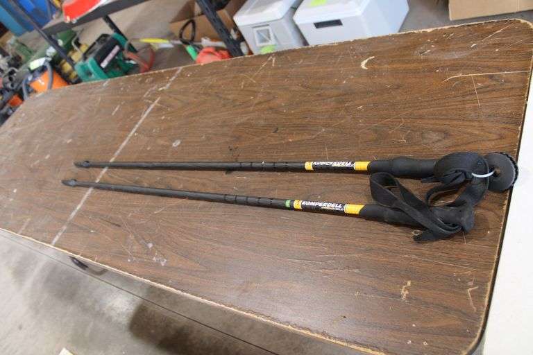 2 new Komperdell folding walking sticks - Lee Real Estate & Auction Service