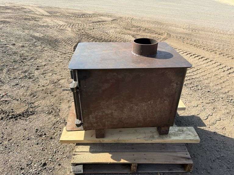 Wonder Warm Cast Wood Burning Stove - Lee Real Estate & Auction Service