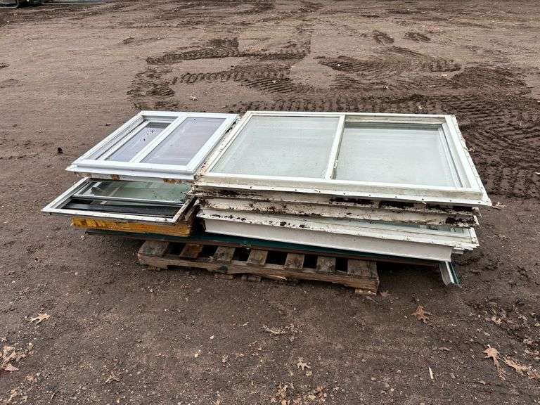 Pallet of Used Windows - Lee Real Estate & Auction Service