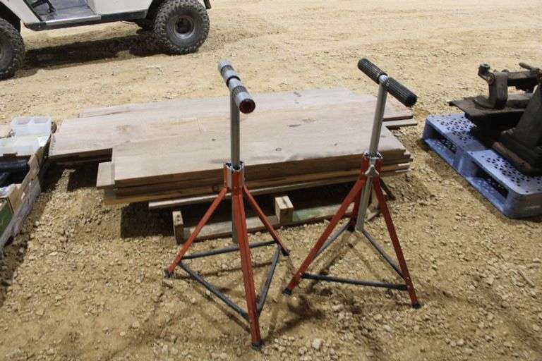 2 adjustable material rollers - Lee Real Estate & Auction Service