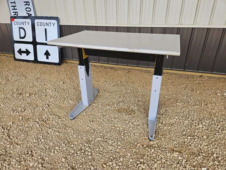 Adjustable Height Table - Lee Real Estate & Auction Service