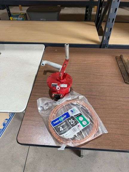 Copper Wire & Hand Crank Pump - Lee Real Estate & Auction Service