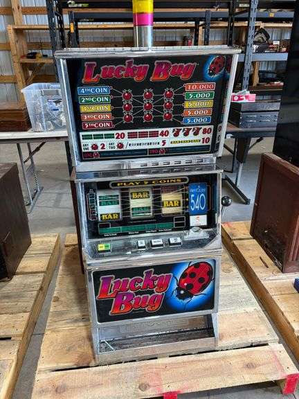 "Lucky Bug" Slot Machine (Read More) - Lee Real Estate & Auction Service