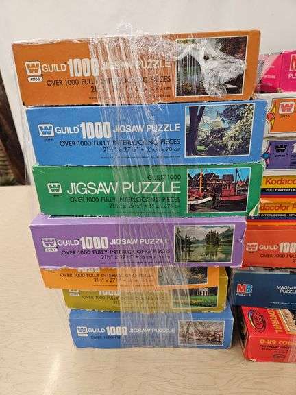 22 jig saw puzzles - Lee Real Estate & Auction Service