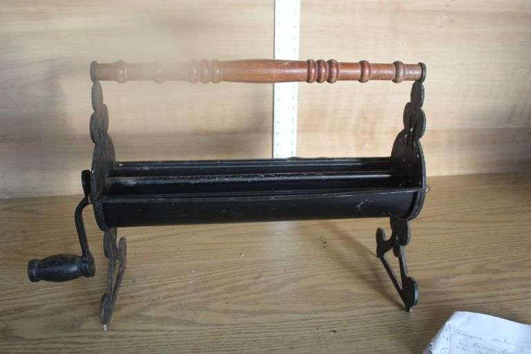 Cast iron paper log roller - Lee Real Estate & Auction Service