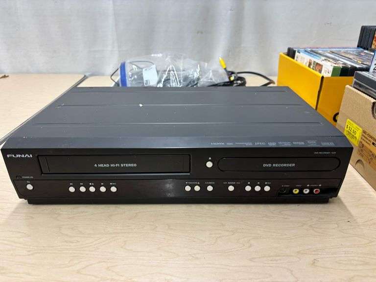 DVD/VHS Player & DVD's - Lee Real Estate & Auction Service