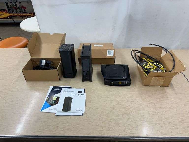 Spectrum Router & Modem - Lee Real Estate & Auction Service