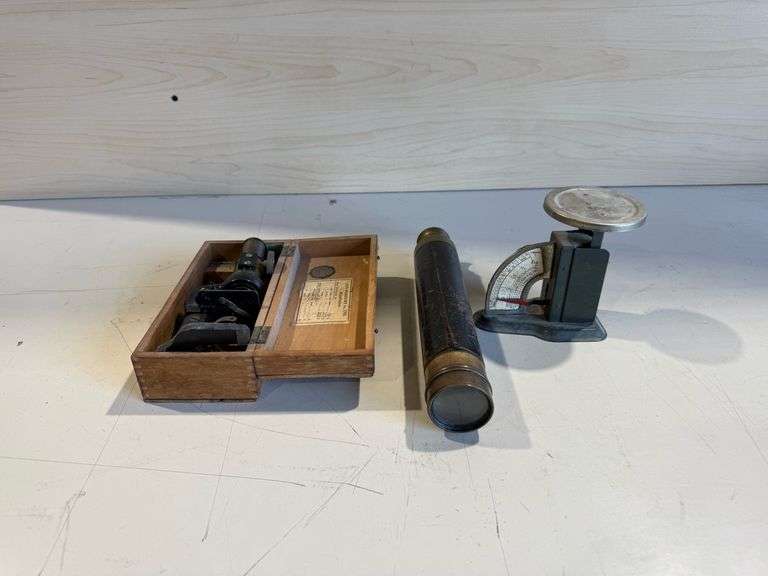 Microscope, Telescope & Scale - Lee Real Estate & Auction Service