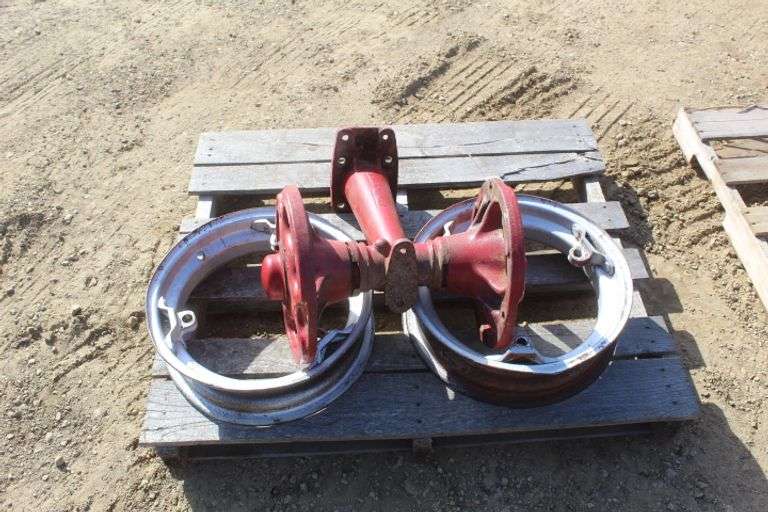 Front pedestal & rims off Farmall M - Lee Real Estate & Auction Service