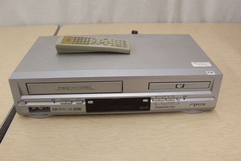 Combination VHS / DVD player w/remote - Lee Real Estate & Auction Service