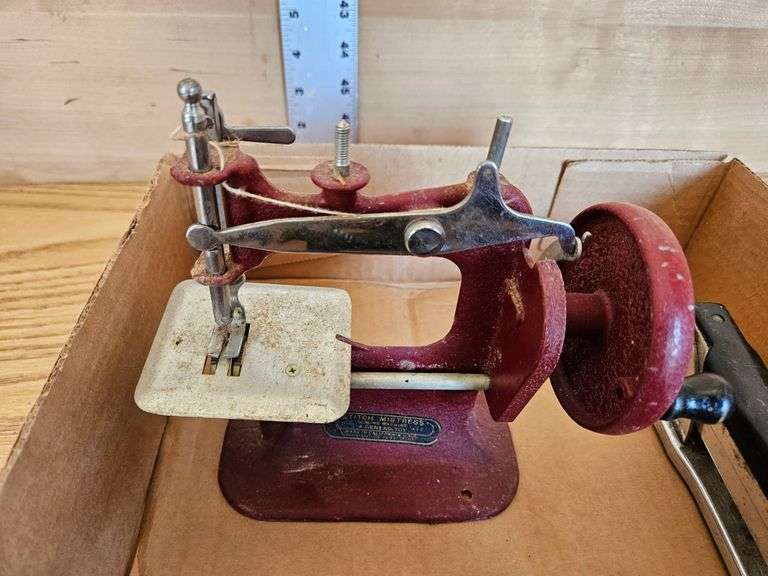 Toy Sewing Machine, Nut Cracker, Iron - Lee Real Estate & Auction Service