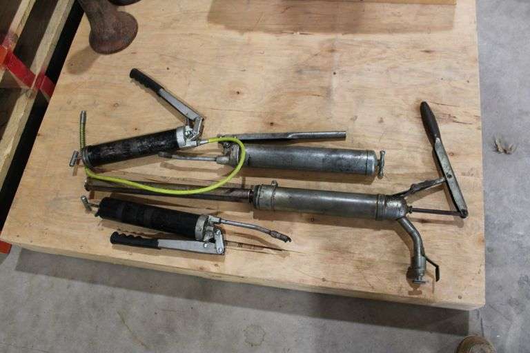 Barrel pump & 3 grease guns - Lee Real Estate & Auction Service