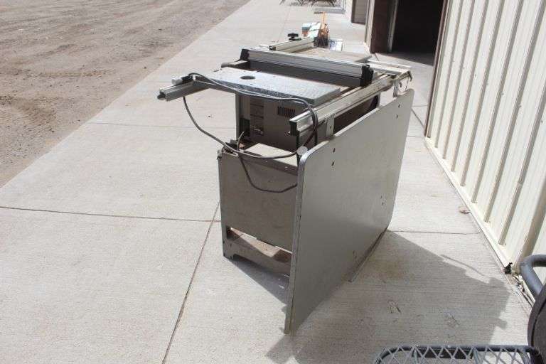 Ryobi 10" elec. table saw w/stand - Lee Real Estate & Auction Service