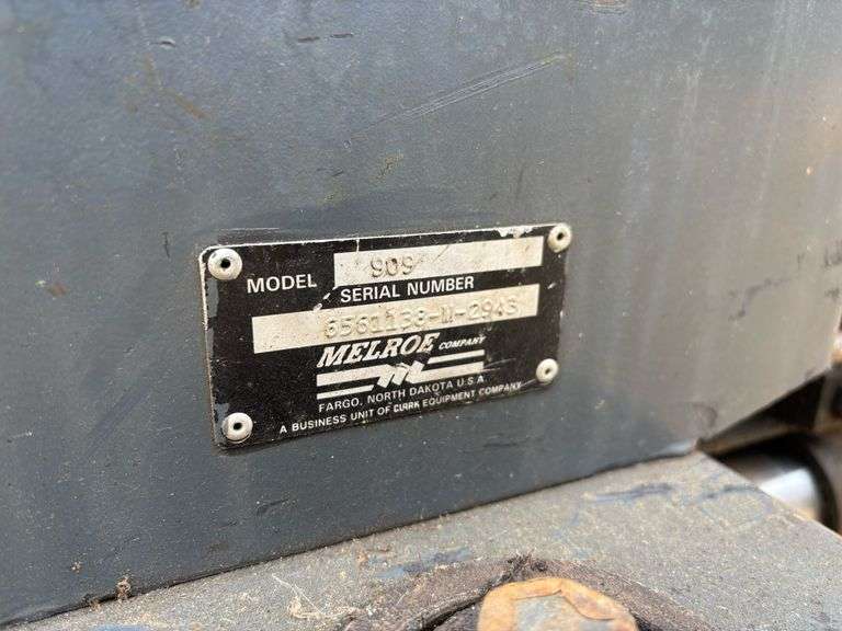 Melroe Skid Steer Backhoe - Lee Real Estate & Auction Service
