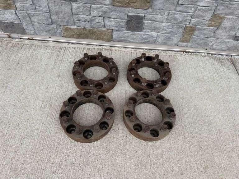 (4) Wheel Spacers for Bobcat Skid Steer - Lee Real Estate & Auction Service