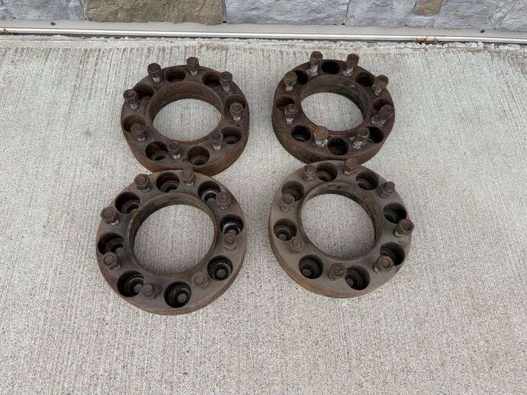 (4) Wheel Spacers for Bobcat Skid Steer - Lee Real Estate & Auction Service