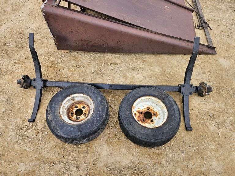 Small Trailer Axle with 10" tires - Lee Real Estate & Auction Service