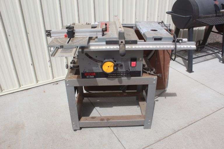 Ryobi 10" elec. table saw w/stand - Lee Real Estate & Auction Service