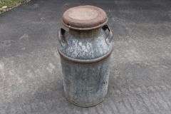 Stainless milker bucket & shotgun can - Lee Real Estate & Auction Service