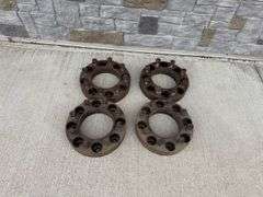 (4) Wheel Spacers for Bobcat Skid Steer - Lee Real Estate & Auction Service