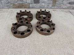 (4) Wheel Spacers for Bobcat Skid Steer - Lee Real Estate & Auction Service