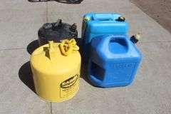 4 - 5 gal. fuel cans - Lee Real Estate & Auction Service