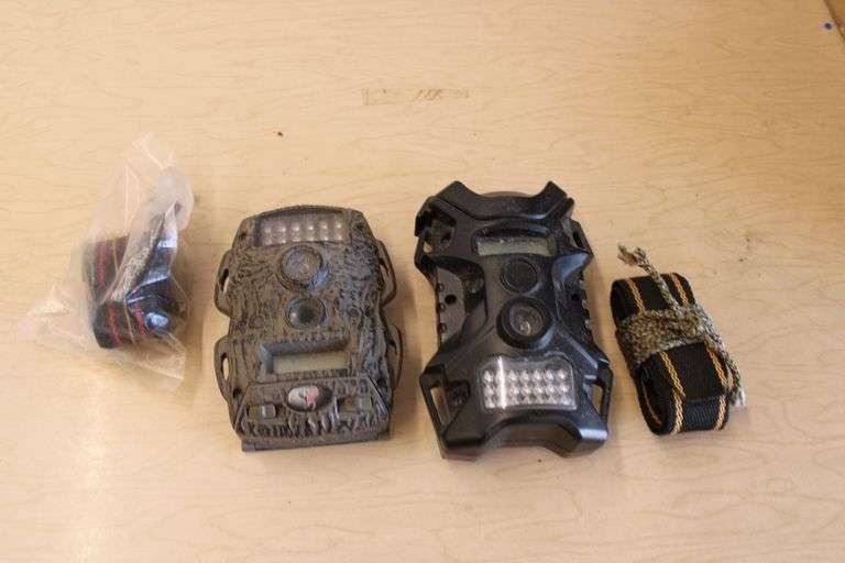2 digital game cameras - Lee Real Estate & Auction Service