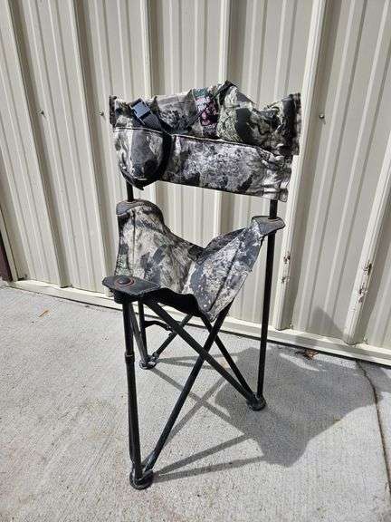 Folding Chair & Fishing Poles - Lee Real Estate & Auction Service
