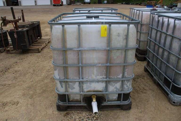 265 Gal Plastic Tote w/ Steel Cage - Lee Real Estate & Auction Service